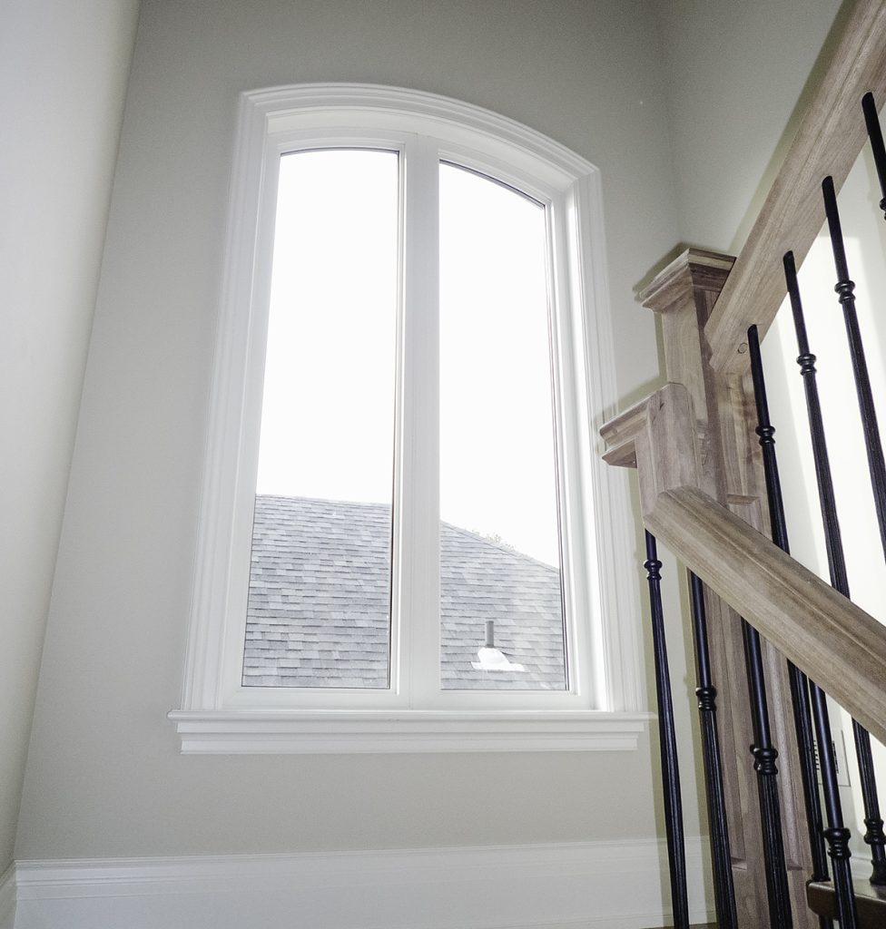 Custom White Shaped Window | Fieldstone Windows & Doors Ltd.