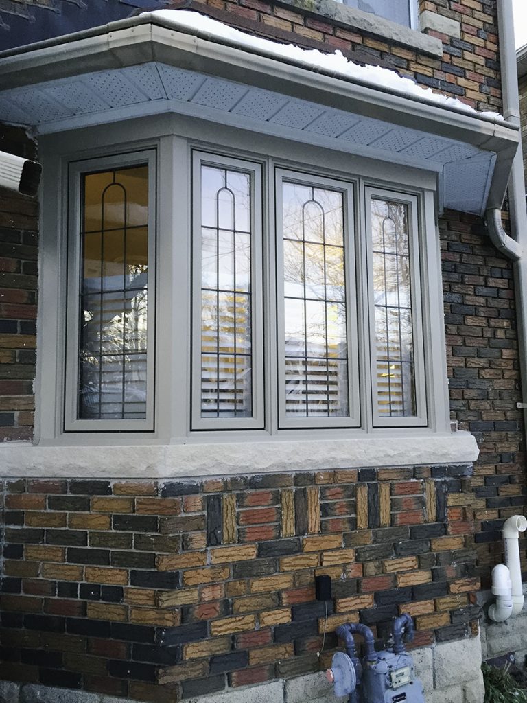 Elegant Metal-Clad Wood Bay Windows with Lead Tape Design | Fieldstone ...