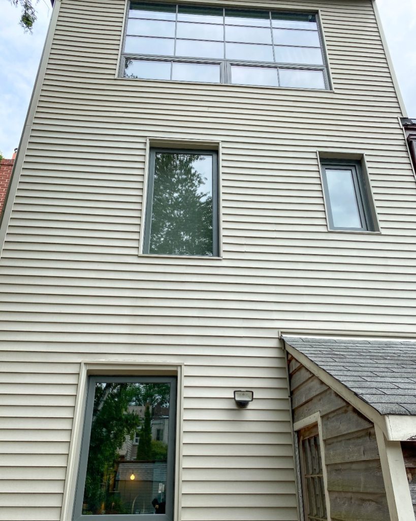 Sleek Slate Vinyl Casement Windows for a Modern Home
